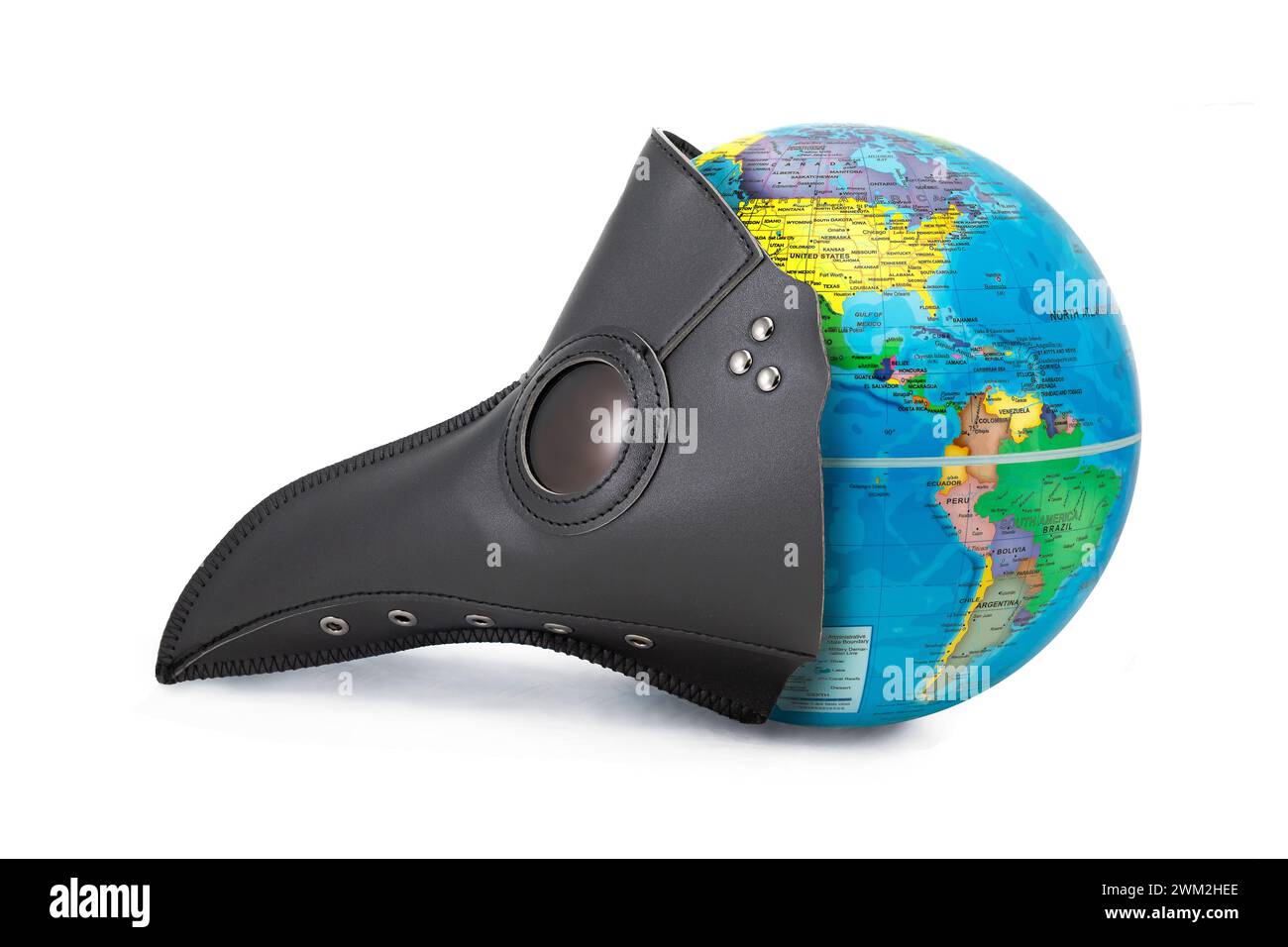 Earth Globe with the plague mask showing America: epidemic concept. The ...