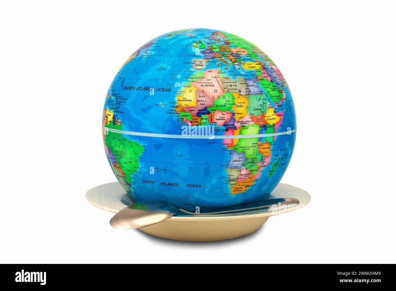 Earth globe inside an empty plate where Africa is shown as a concept of ...
