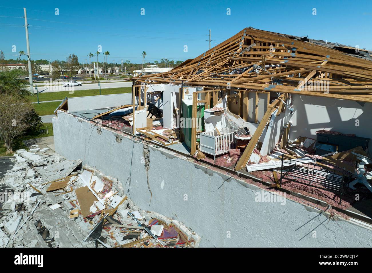 Damaged house roof and walls after hurricane Ian in Florida ...