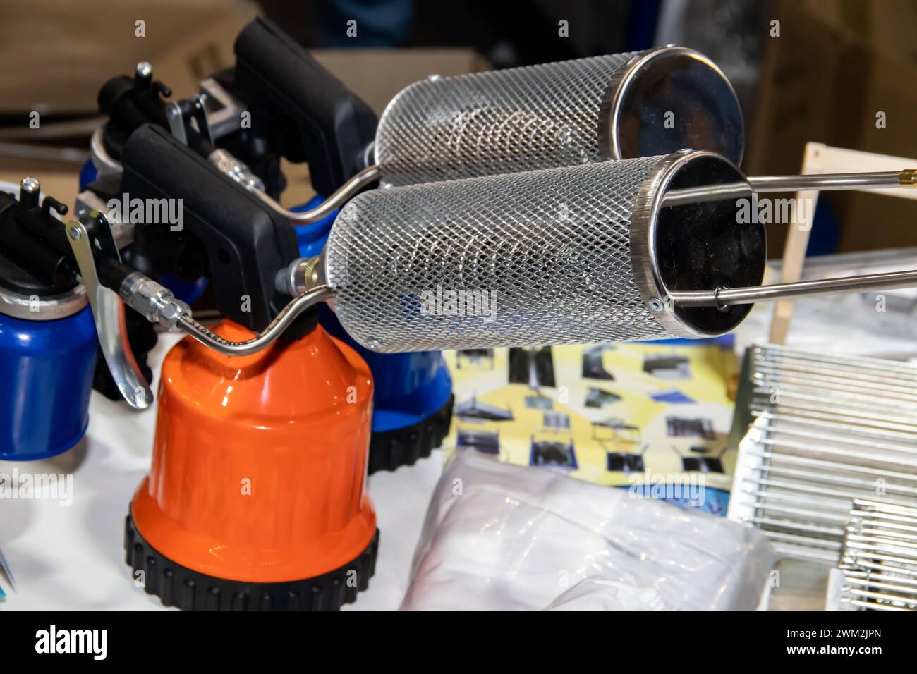 Bees smoker beekeeping tool works with bees near the hives, equipment ...