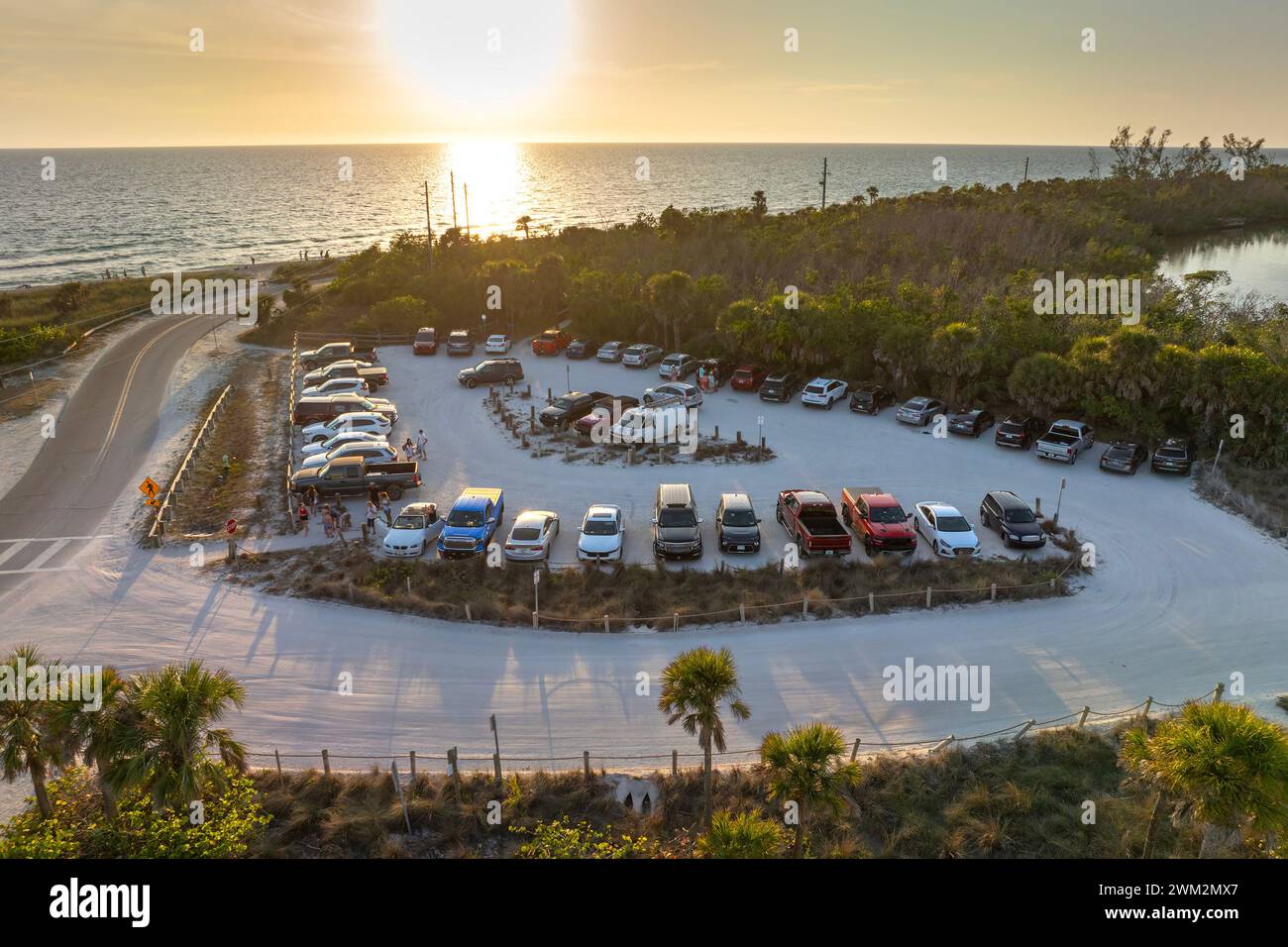 Parking lot at Blind Pass beach on Manasota Key in Englewood. Tourists ...