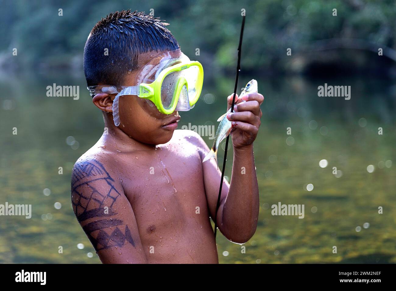 Kid with snorkel mask from embera tribe, chagres national park, fishing ...