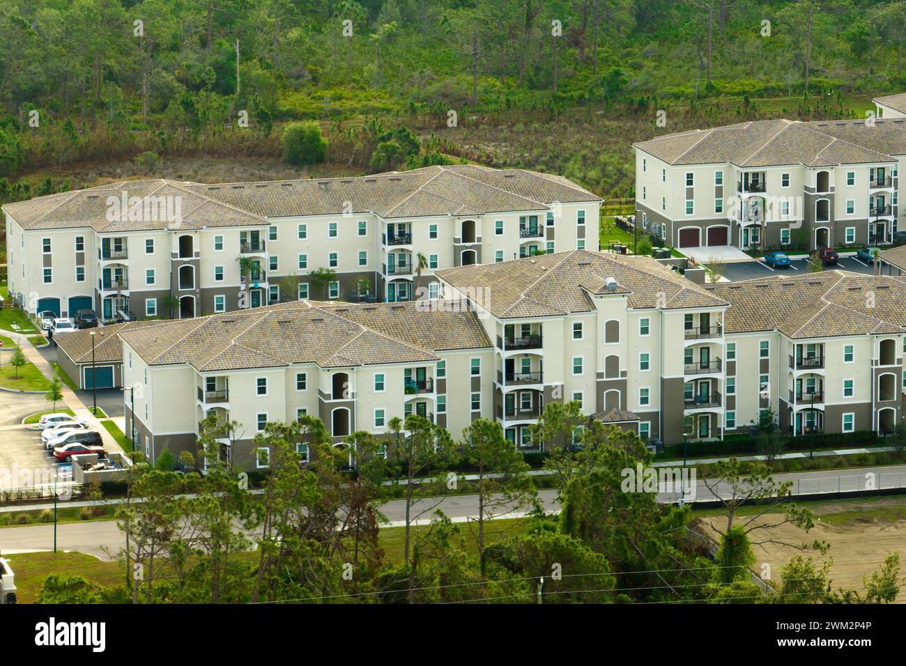 Top view of new apartment condos in Florida suburban area. Family ...