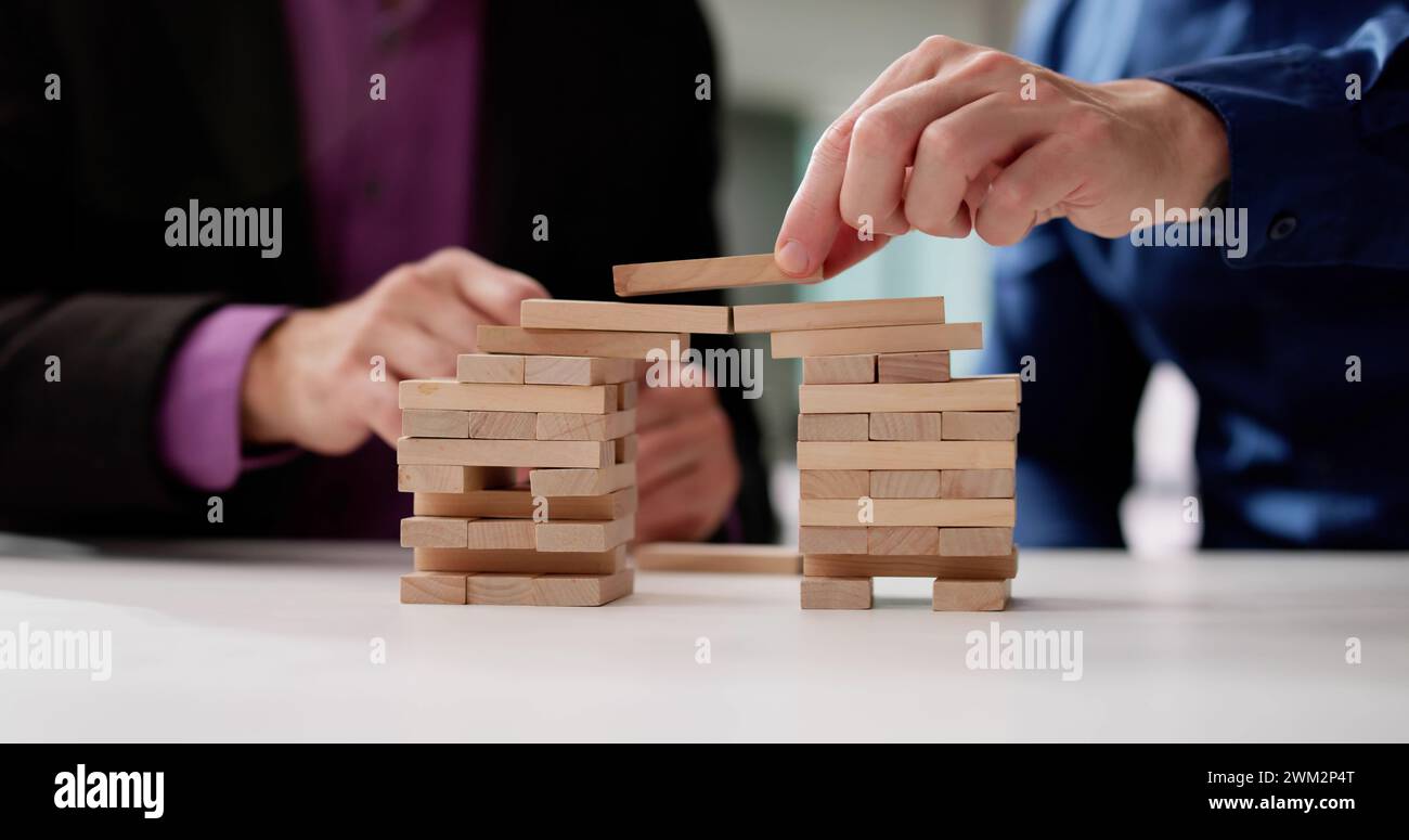 Bridge Building Using Wooden Blocks. Closing Gap Stock Photo - Alamy