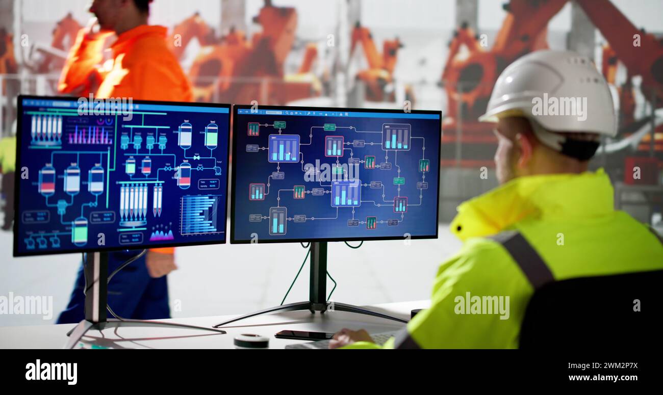 Engineer Using PC In Car Factory Automated Assembly Line Stock Photo ...