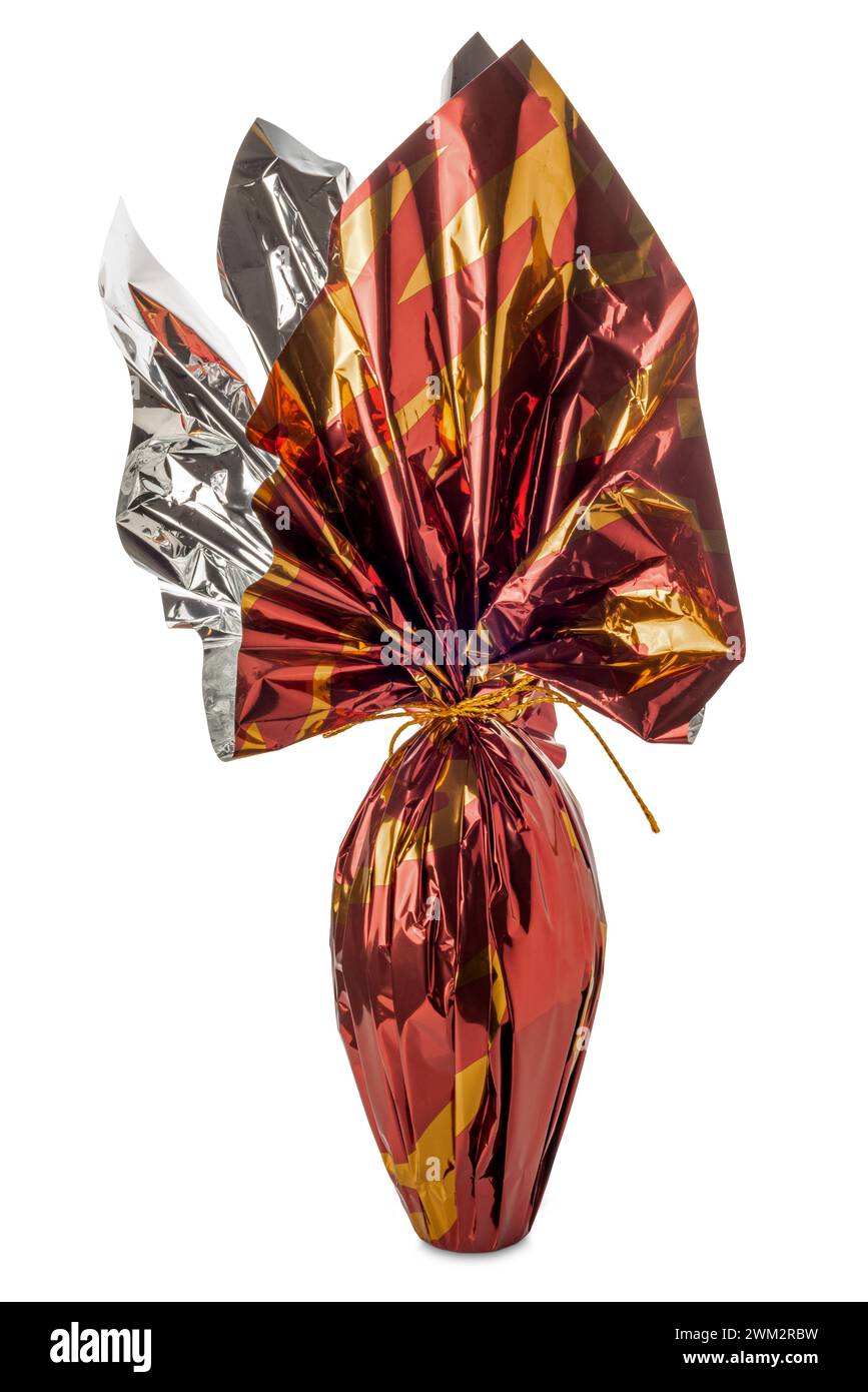 Easter egg wrapped in glittering brown and yellow paper isolated on ...