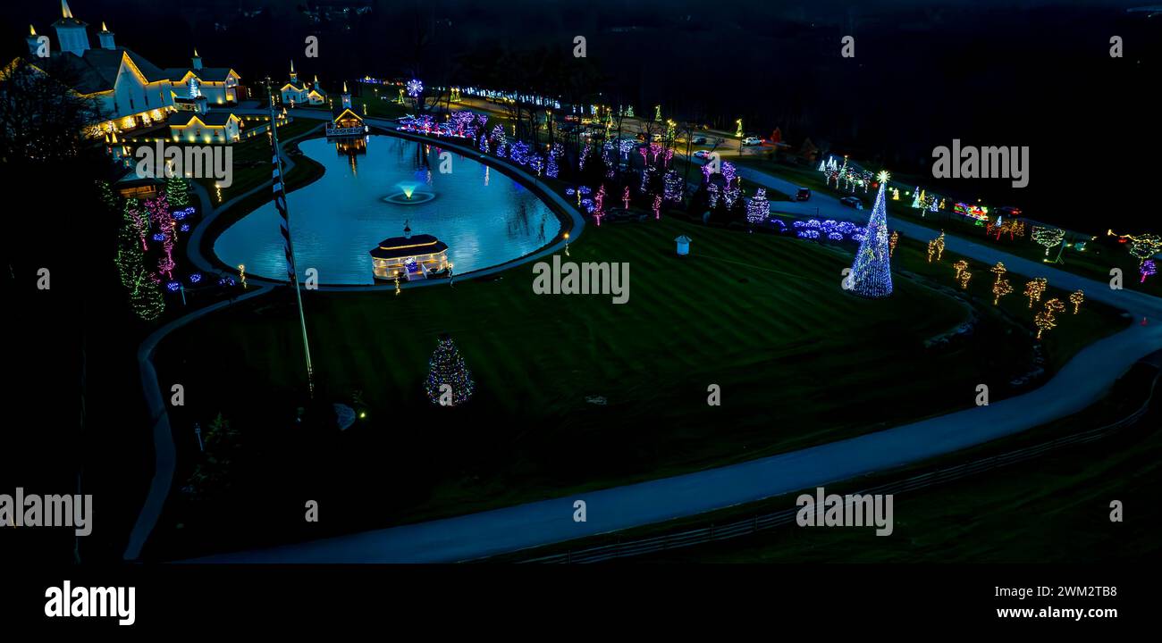 Aerial View Of A Reflective Pond Amidst A Serpentine Pathway Surrounded ...