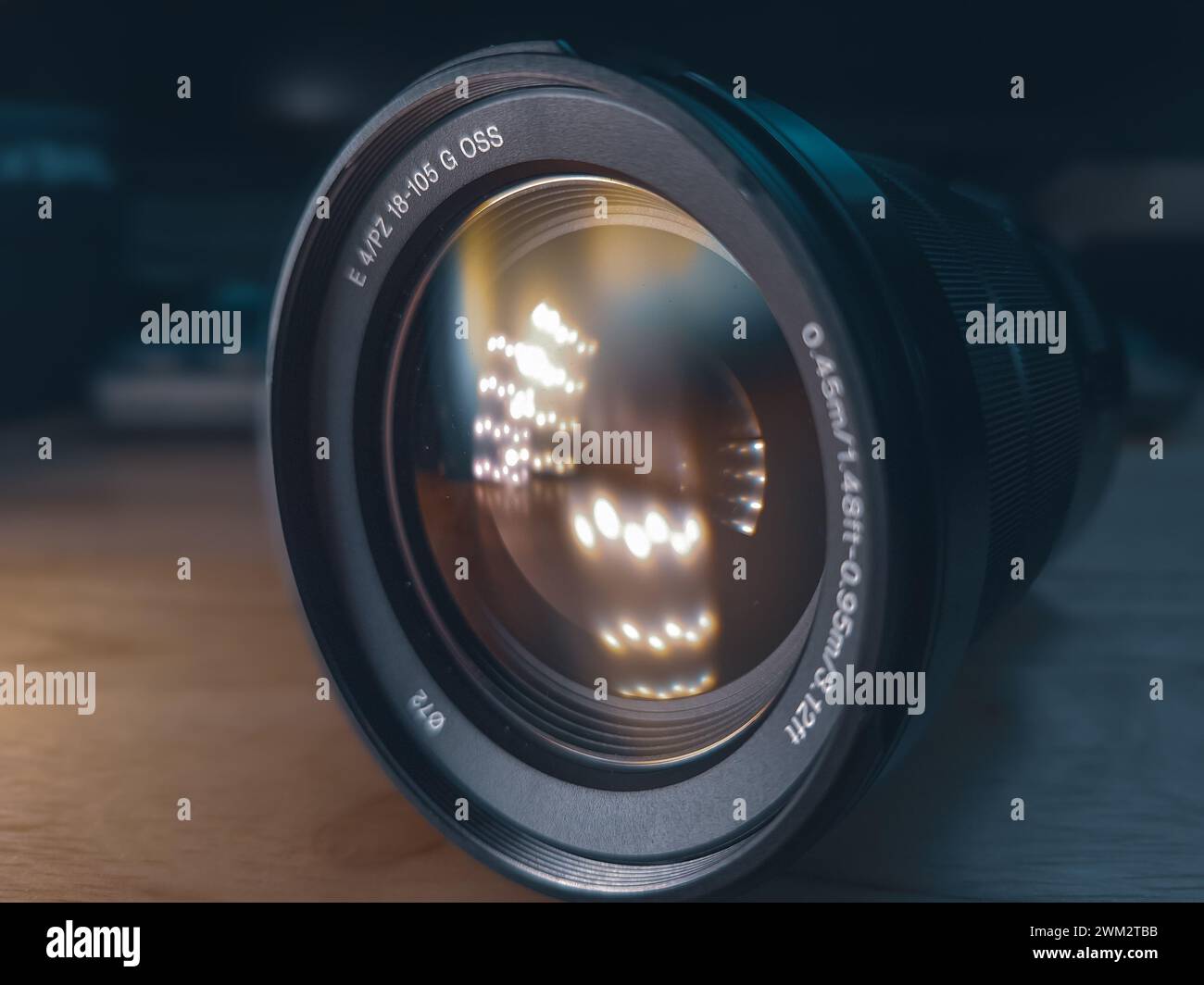 A professional camera lens resting horizontally Stock Photo - Alamy