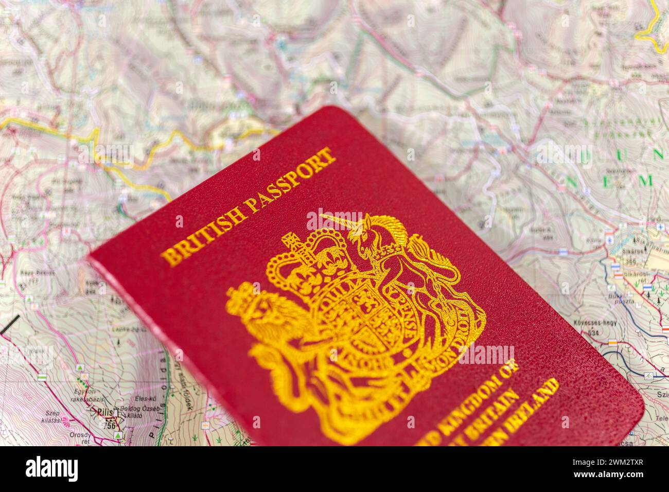 British passport on an old paper map Stock Photo - Alamy