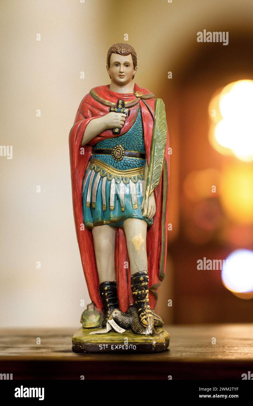 Statue of Saint Expedite in blurred religious church background Stock ...