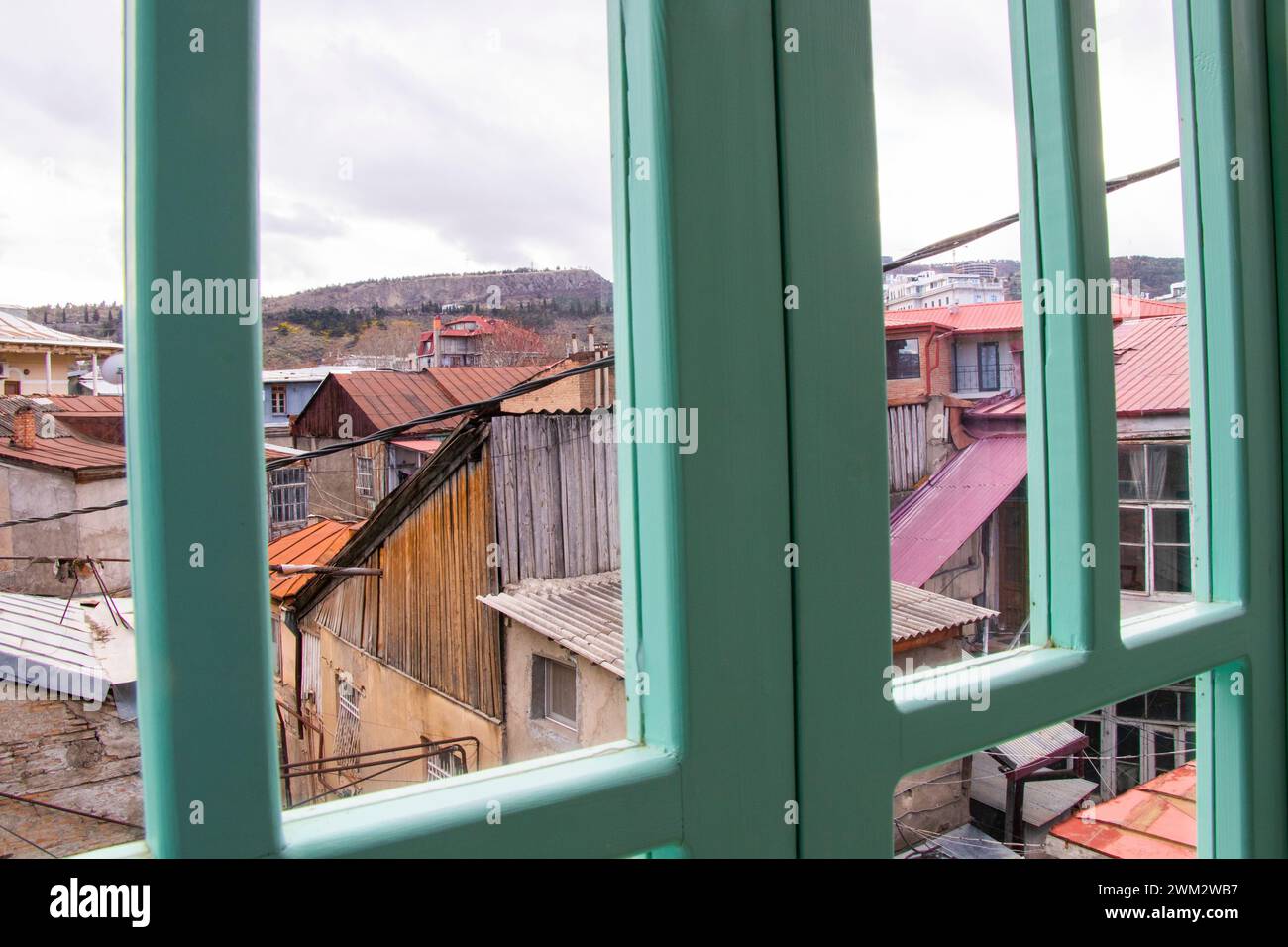 View from open window with background of multiple buildings Stock Photo ...