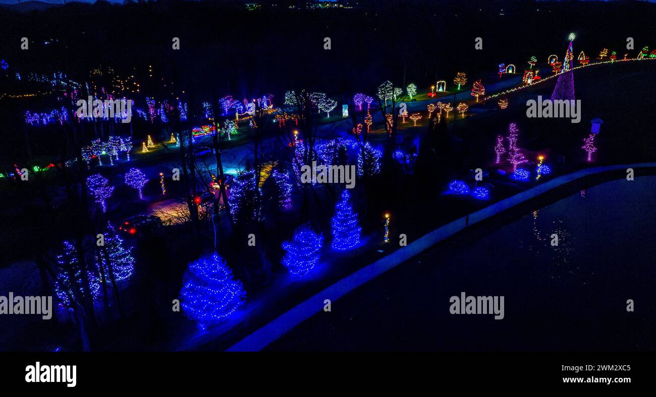 Night View Of A Vibrant Display Of Blue And Purple Christmas Lights On ...