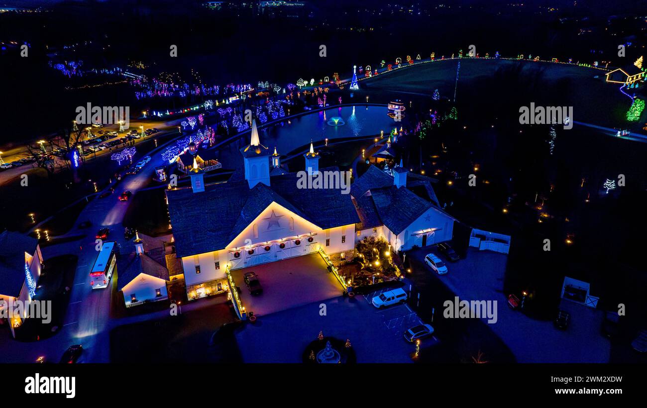 Overhead Night View Of A Complex With Buildings Outlined In Lights, A ...