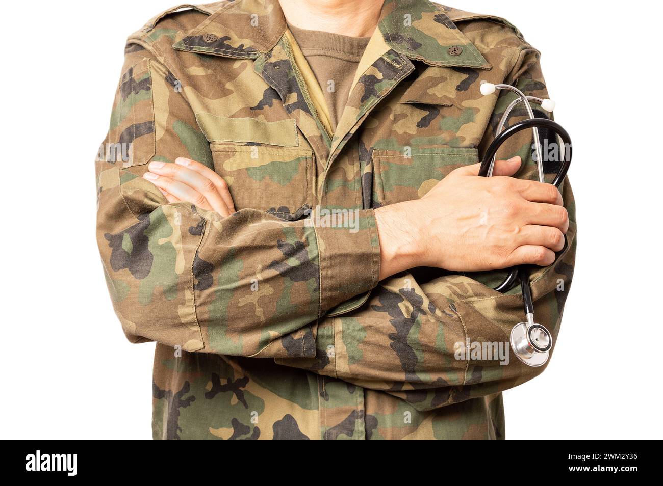 Closeup of a military doctor with a stethoscope his hand. The man is ...