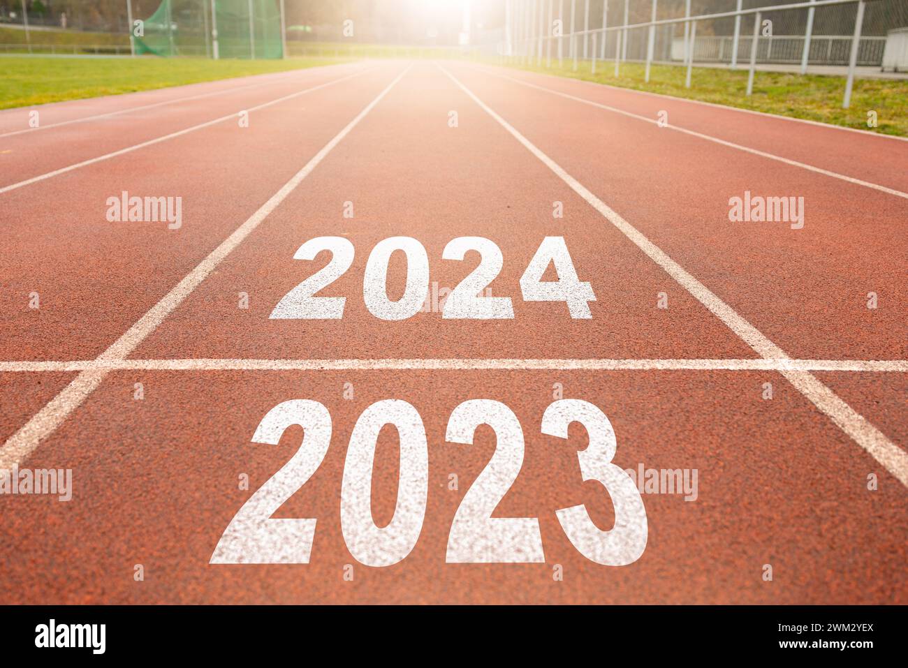 Happy new year 2024 symbolizes the start of the new year. Rear view of ...