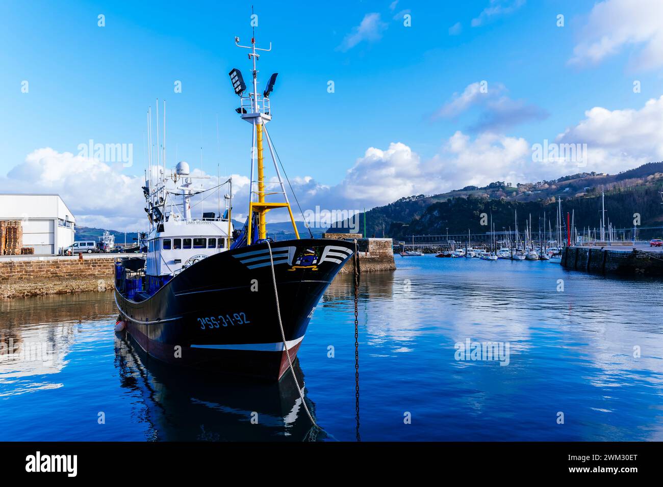 Deep sea fishing boat docked in the Getaria port. Getaria, Guipúzcoa ...