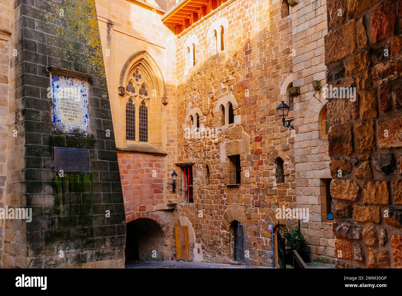 Tower house Ochoa and Ibañez de Olano and church of San Salvador, both ...