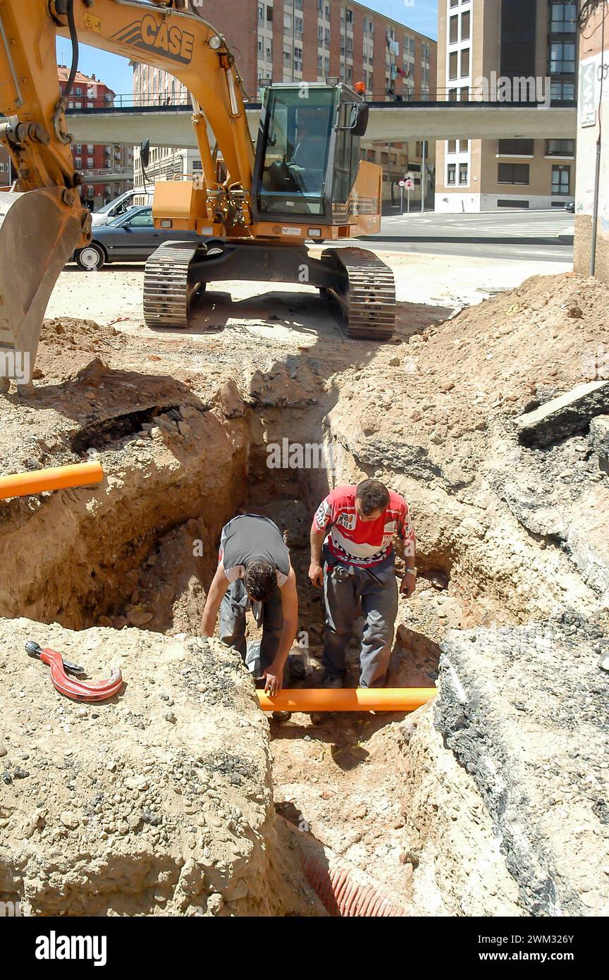 Plumbing repair man excavator hi-res stock photography and images - Alamy