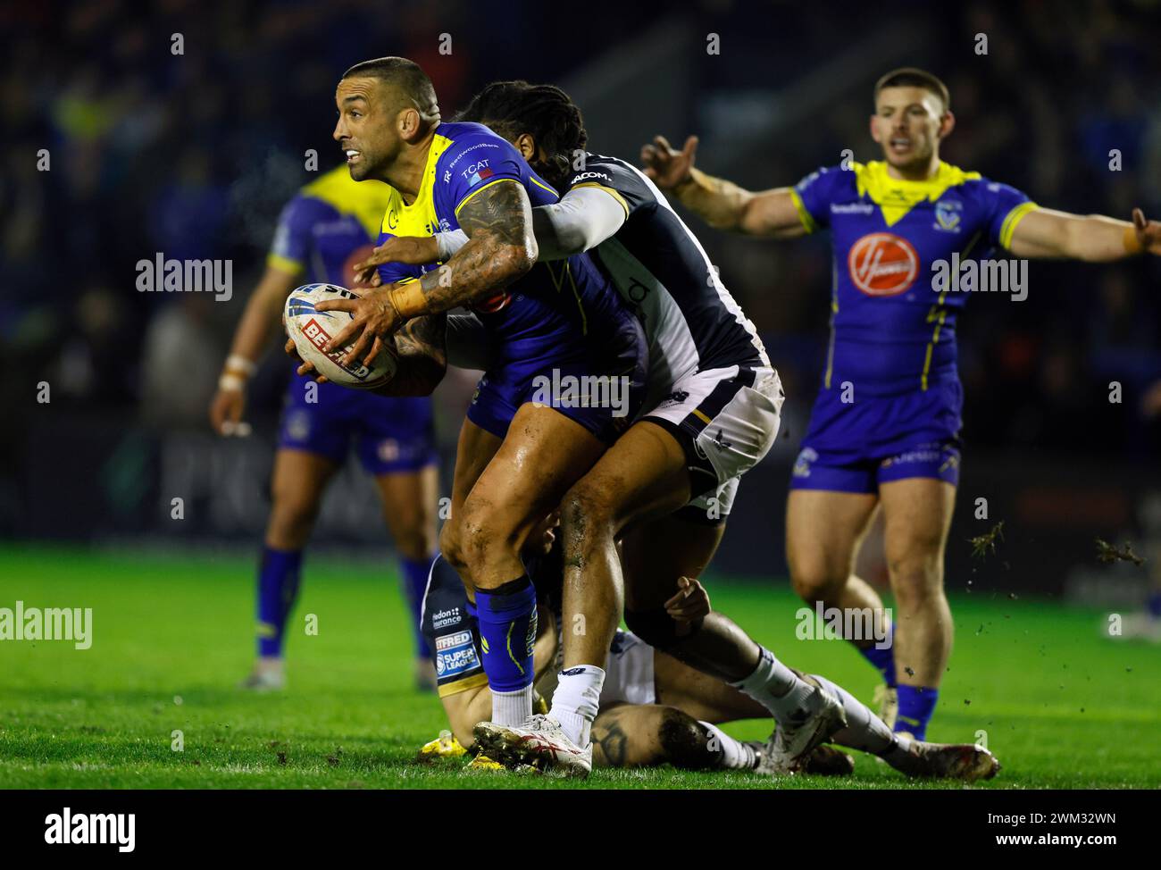 Warrington Wolves' Paul Vaughan is tackled during the Betfred Super ...