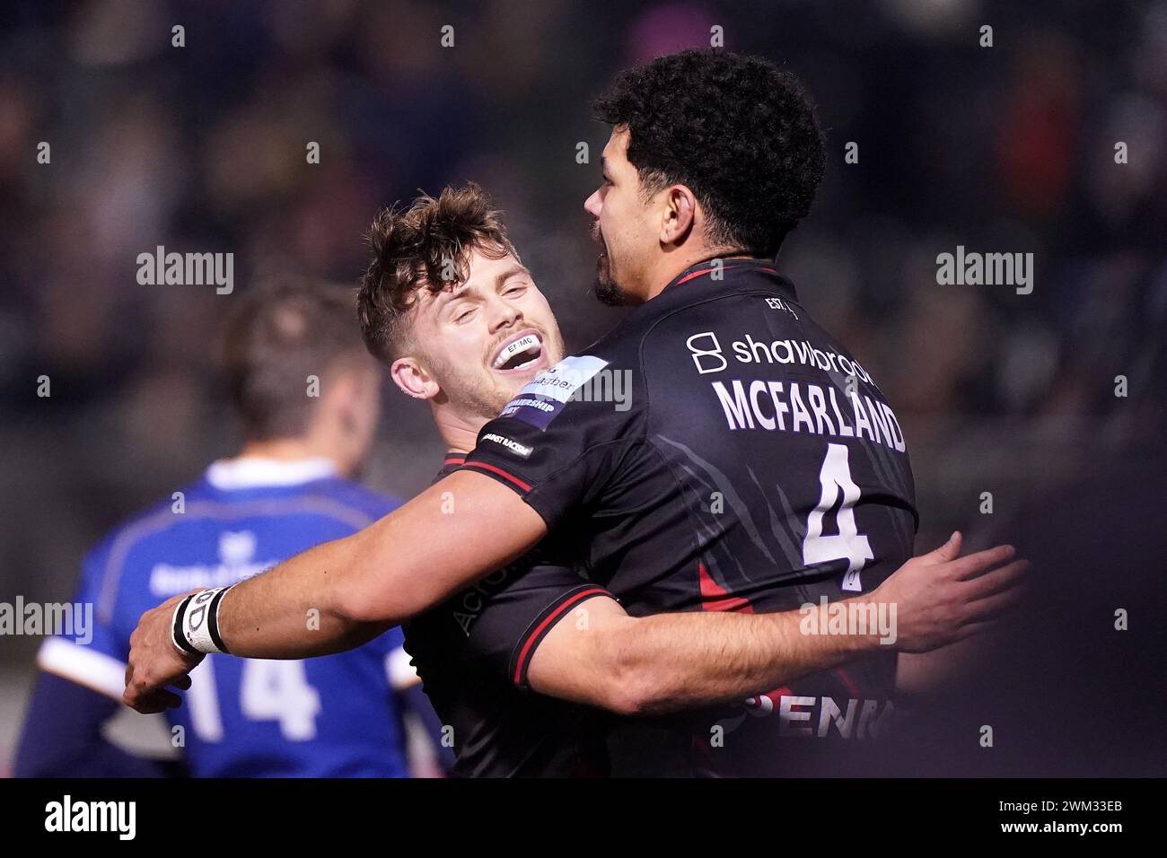 Saracens' Theo McFarland (right) celebrates scoring their side's second ...