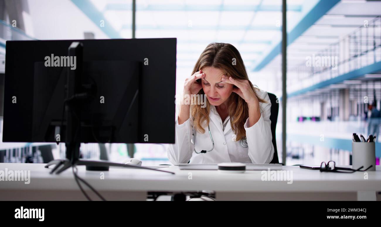 Stressed mature female doctor hi-res stock photography and images - Alamy