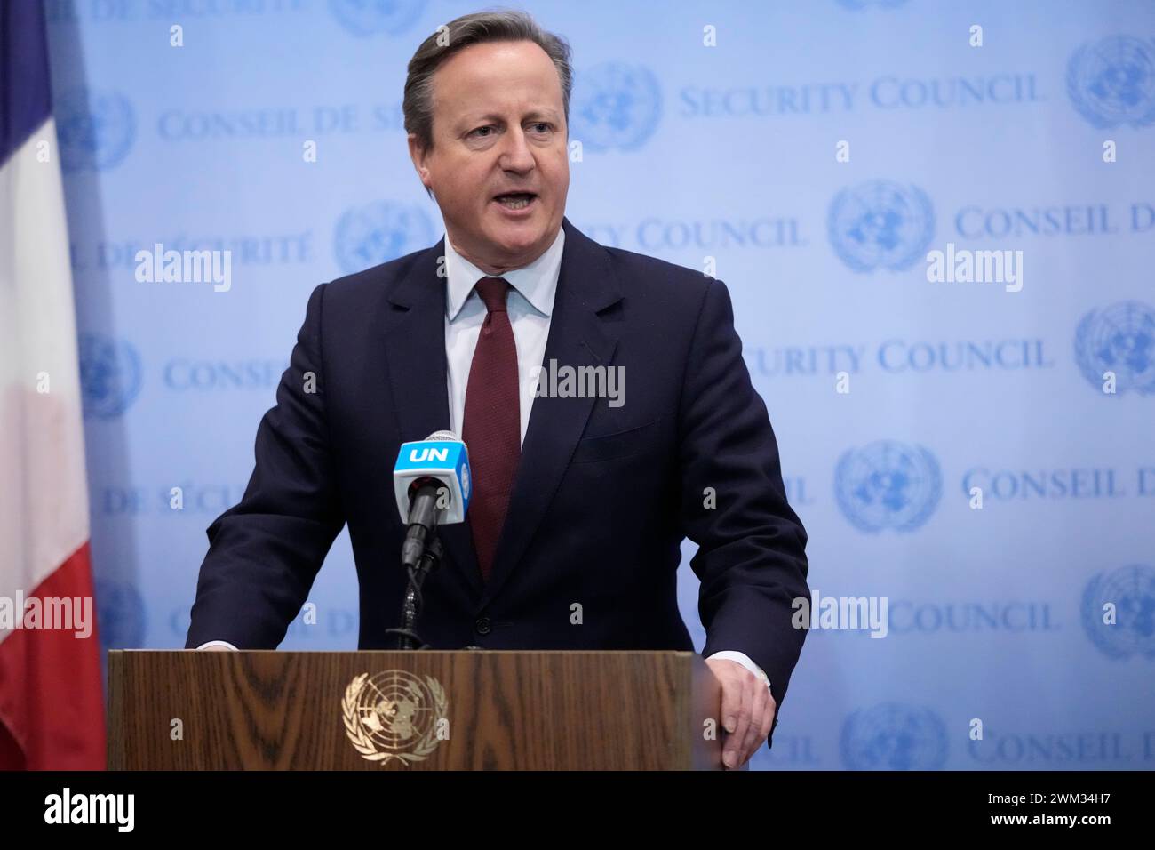 British Foreign Minister David Cameron speaks to reporters before a ...