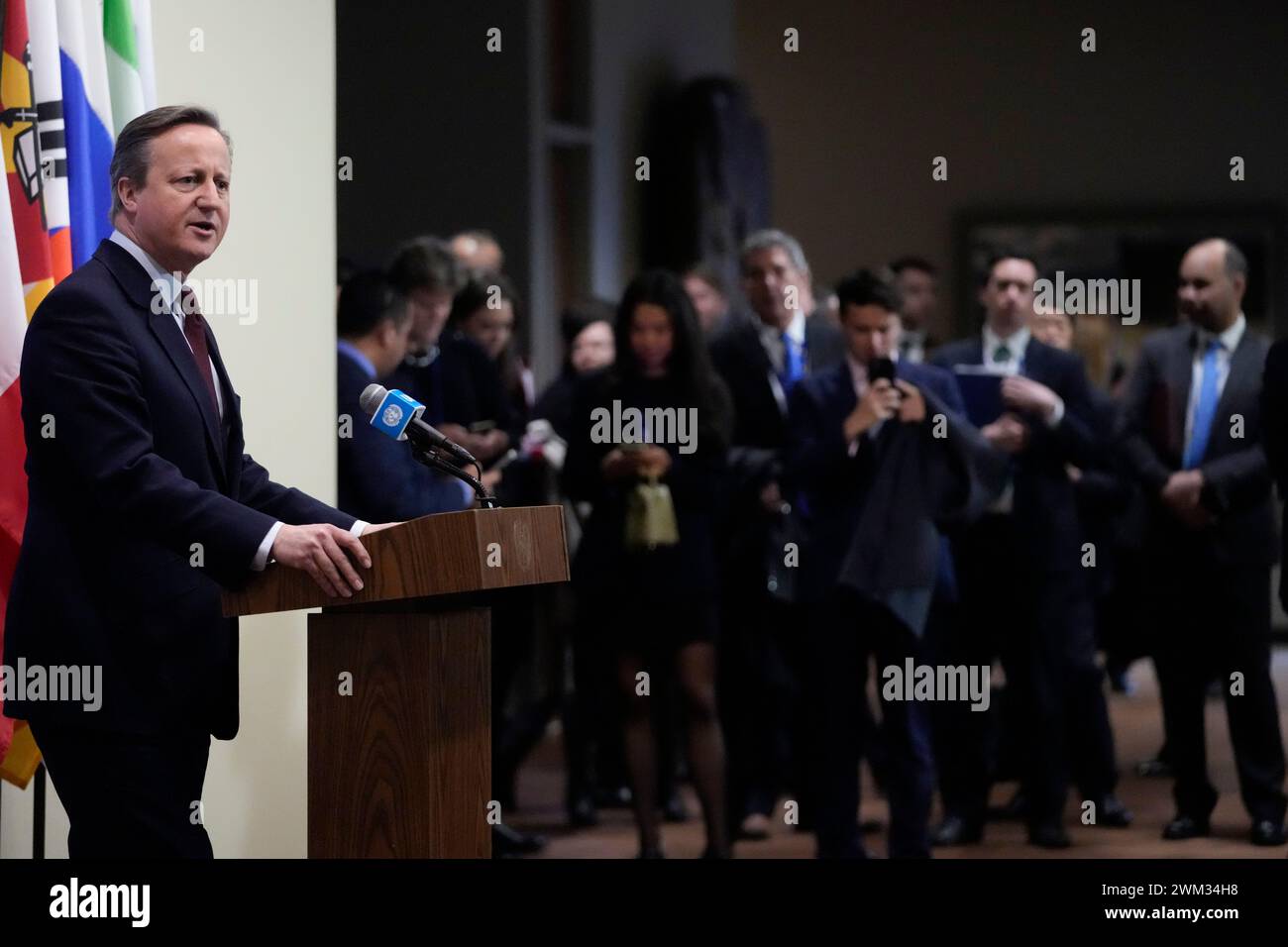 British Foreign Minister David Cameron speaks to reporters before a ...