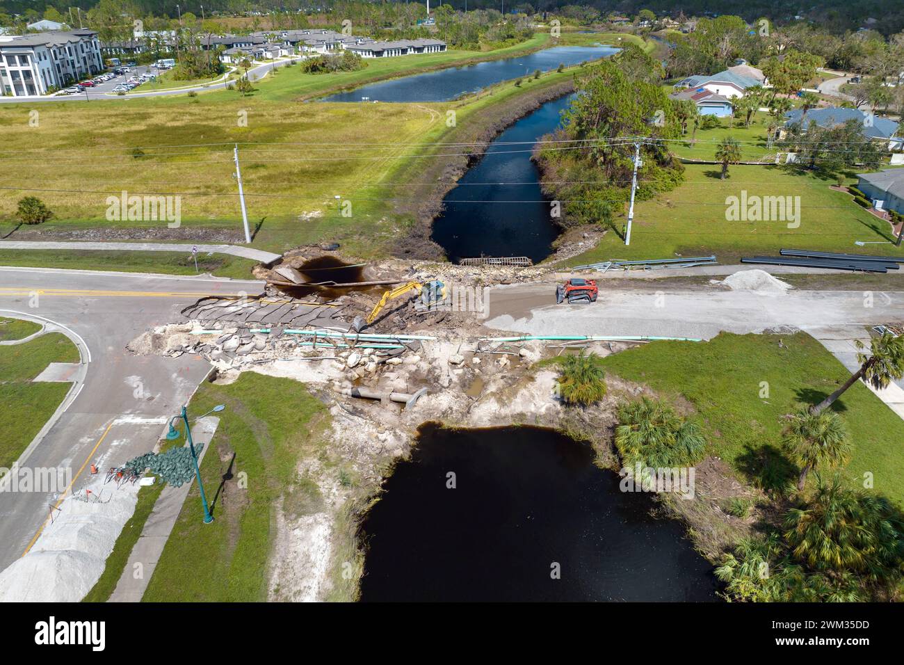 Repair of destroyed bridge after hurricane flood in Florida. Reconstruction of damaged road ...