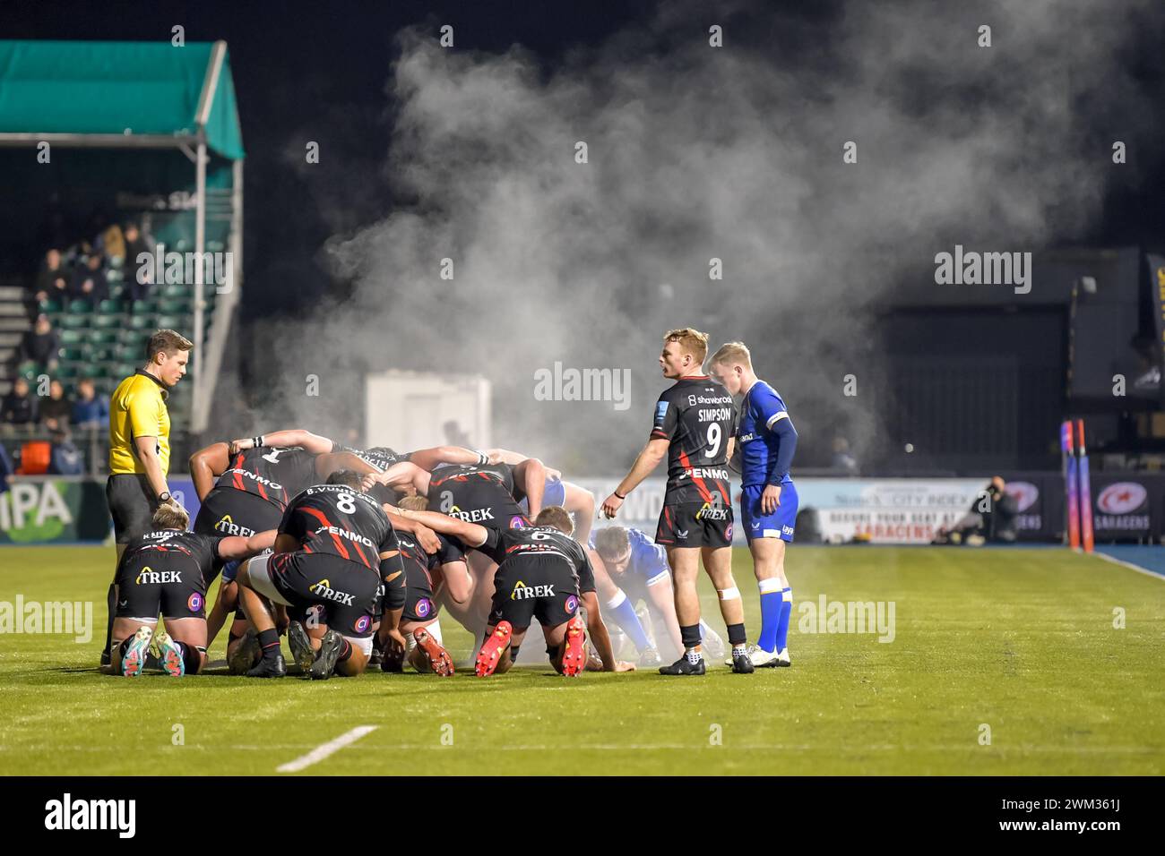 The players prepare scrum as steam rises on a cold evening during the ...