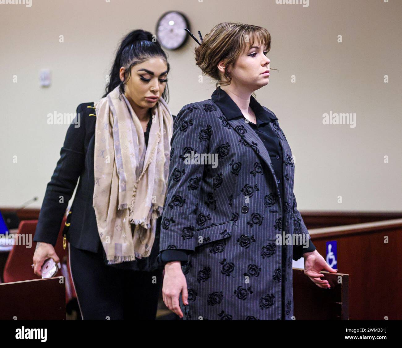 Movie weapons supervisor Hannah Gutierrez-Reed, right, walks out of the ...