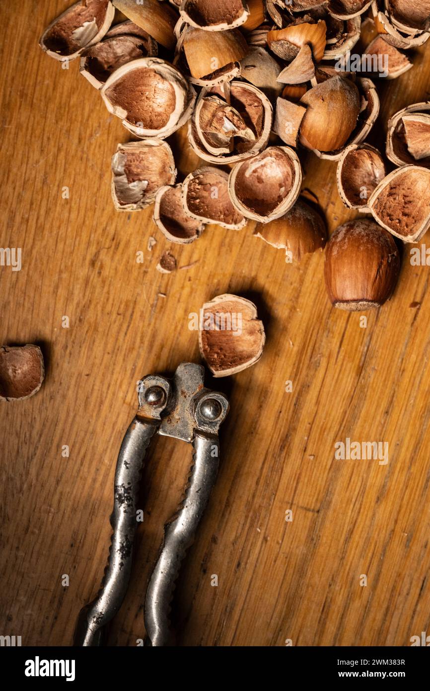 Large pile of hazelnuts with nut cracker Stock Photo - Alamy