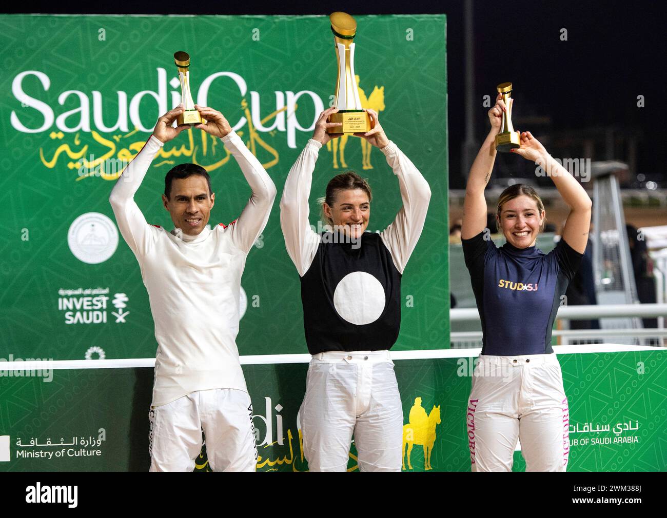 Winner jockey Maryline Eon, center, second Camillo Ospina, left, and ...