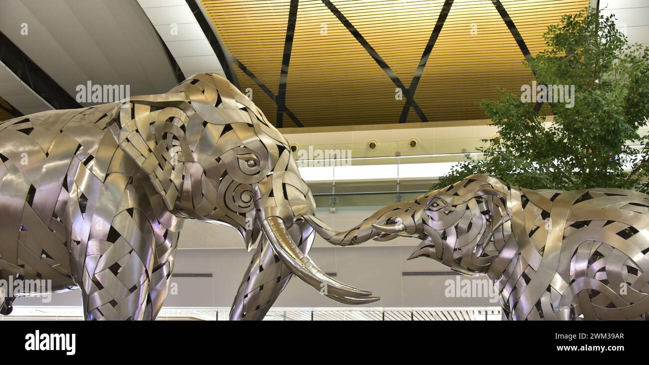 Metal adult and baby elephant statues decorate the recently opened SAT ...