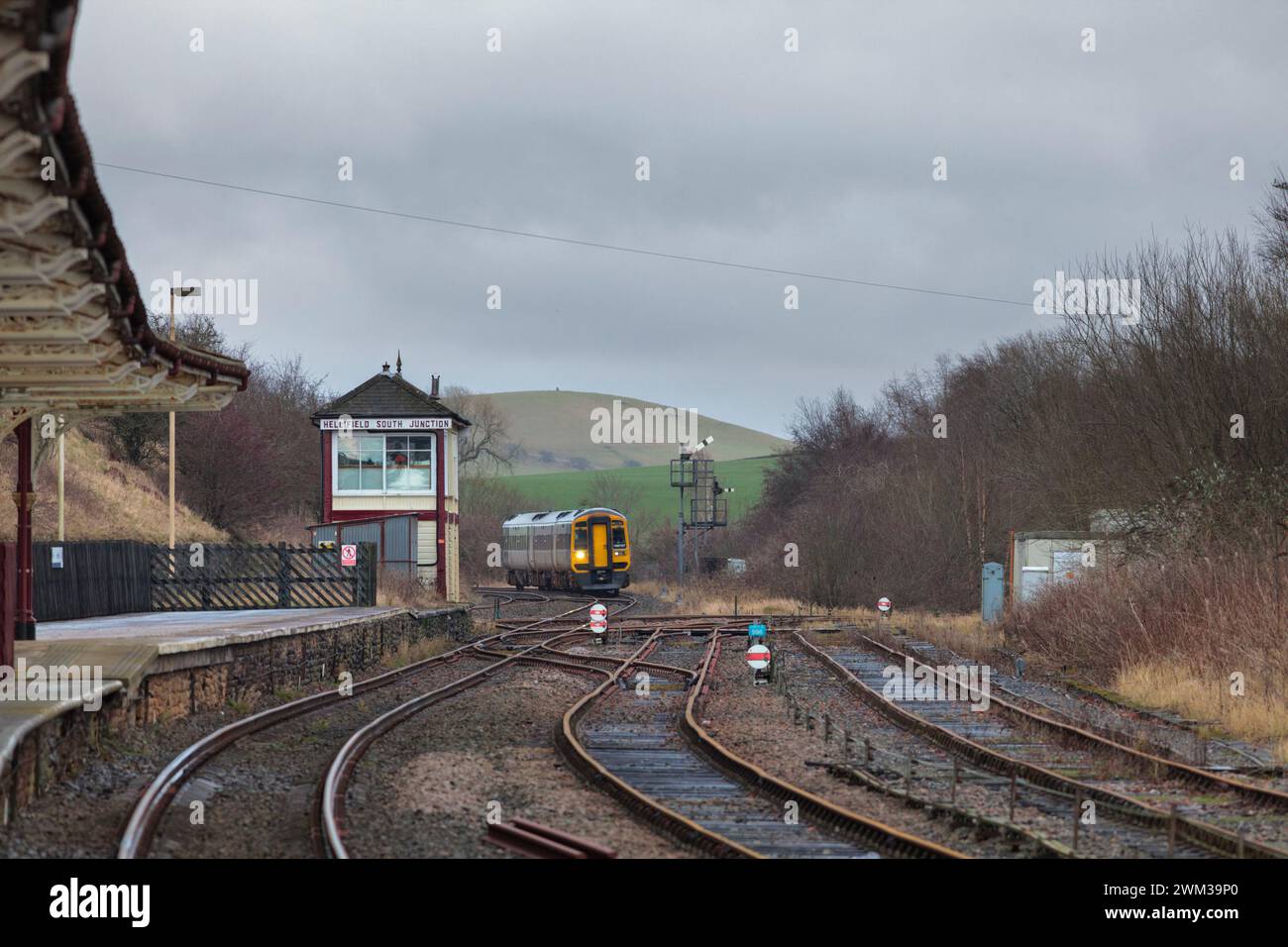 Northern Rail class 158 train 158757 passing the Midland railway signal box and semaphore ...