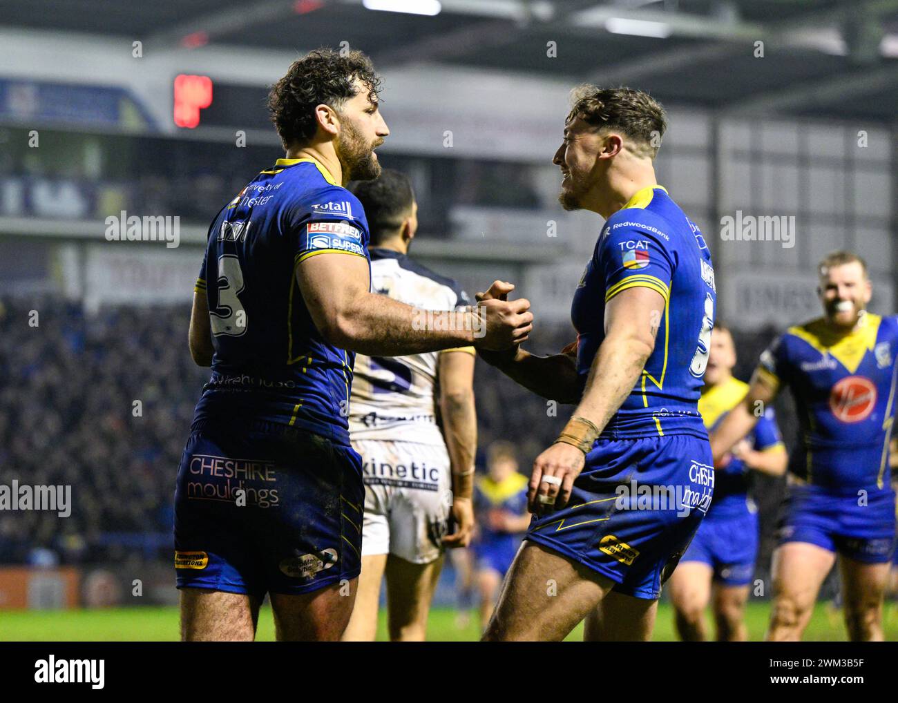 Toby King of Warrington Wolves celebrates his try to make it 26-10 ...