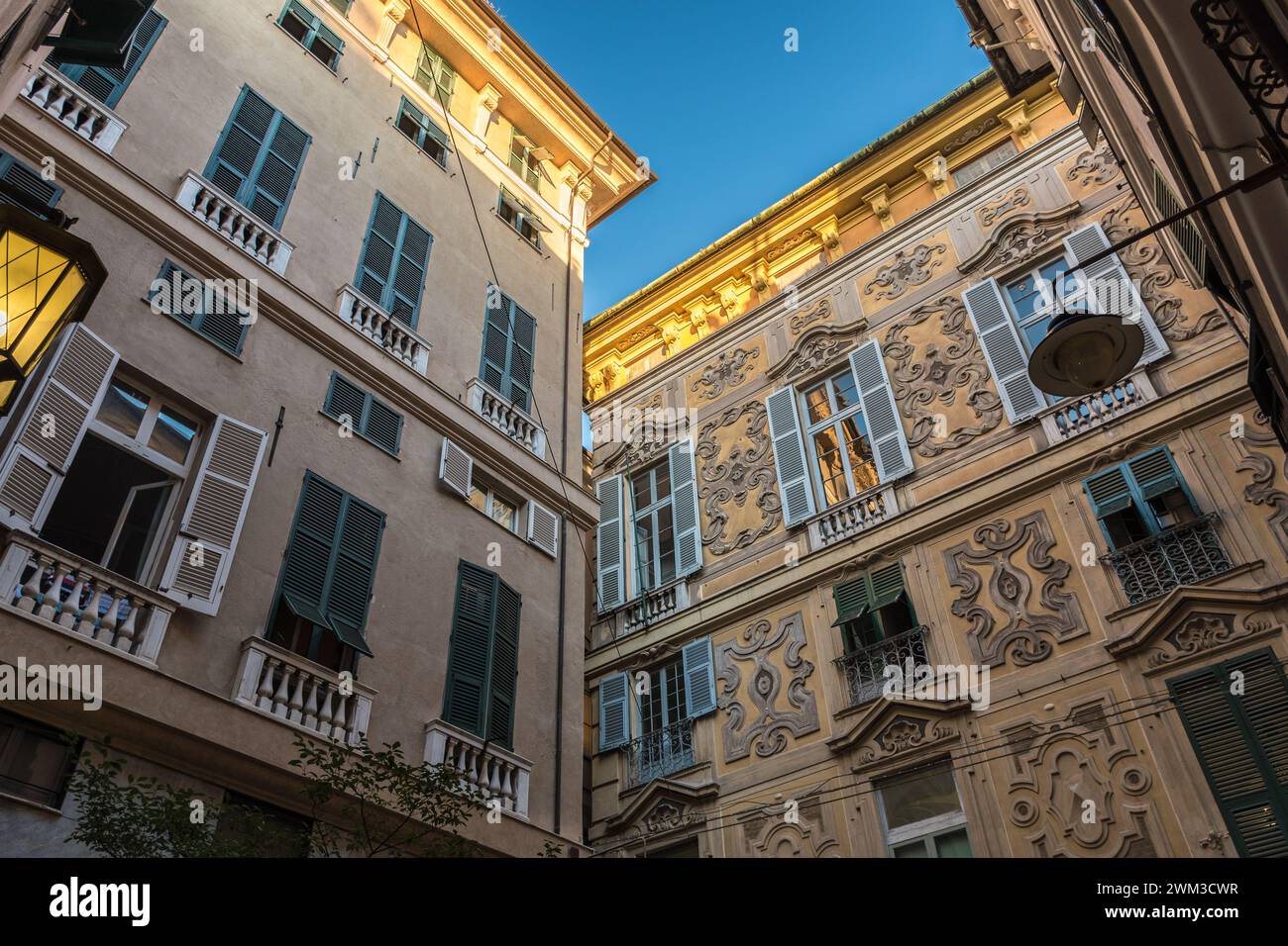 Typical view of a dark alley in the downtown of Genoa Stock Photo - Alamy