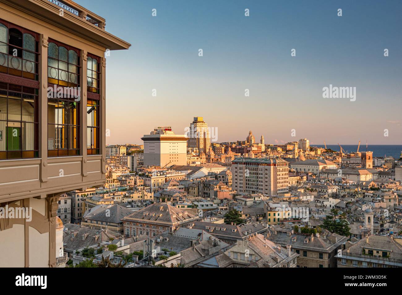 Aerial view of the downtown of Genoa at the sunset seen from ...