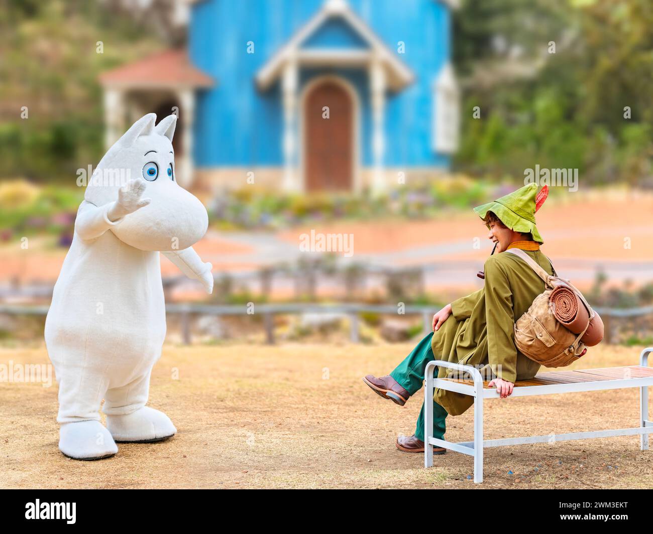 japan, saitama - mar 26 2023: Moomintroll costume waving hand to his ...