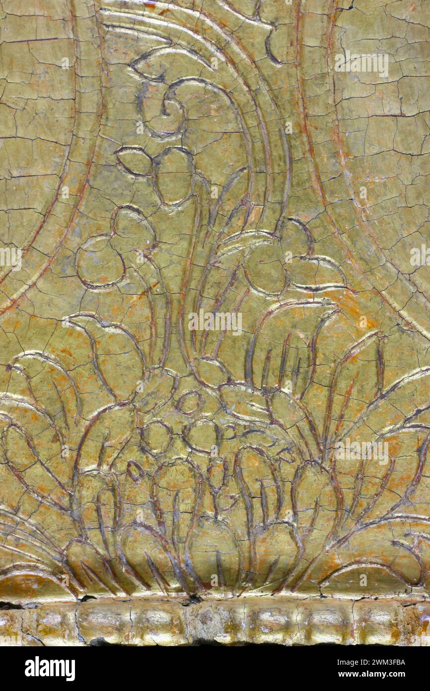 gold with carvings on the old icon. restoration of the icon, gold ...