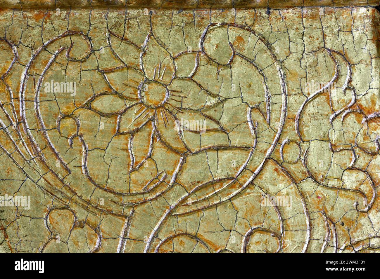 gold with carvings on the old icon. restoration of the icon, gold ...