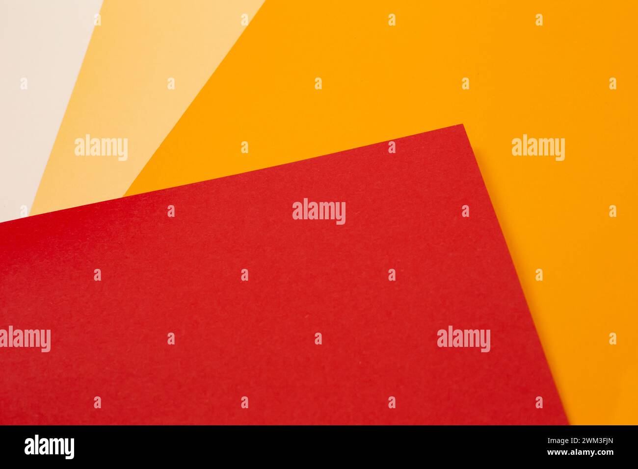 sheets of colored paper. Many colored sheets of paper are laid out in ...