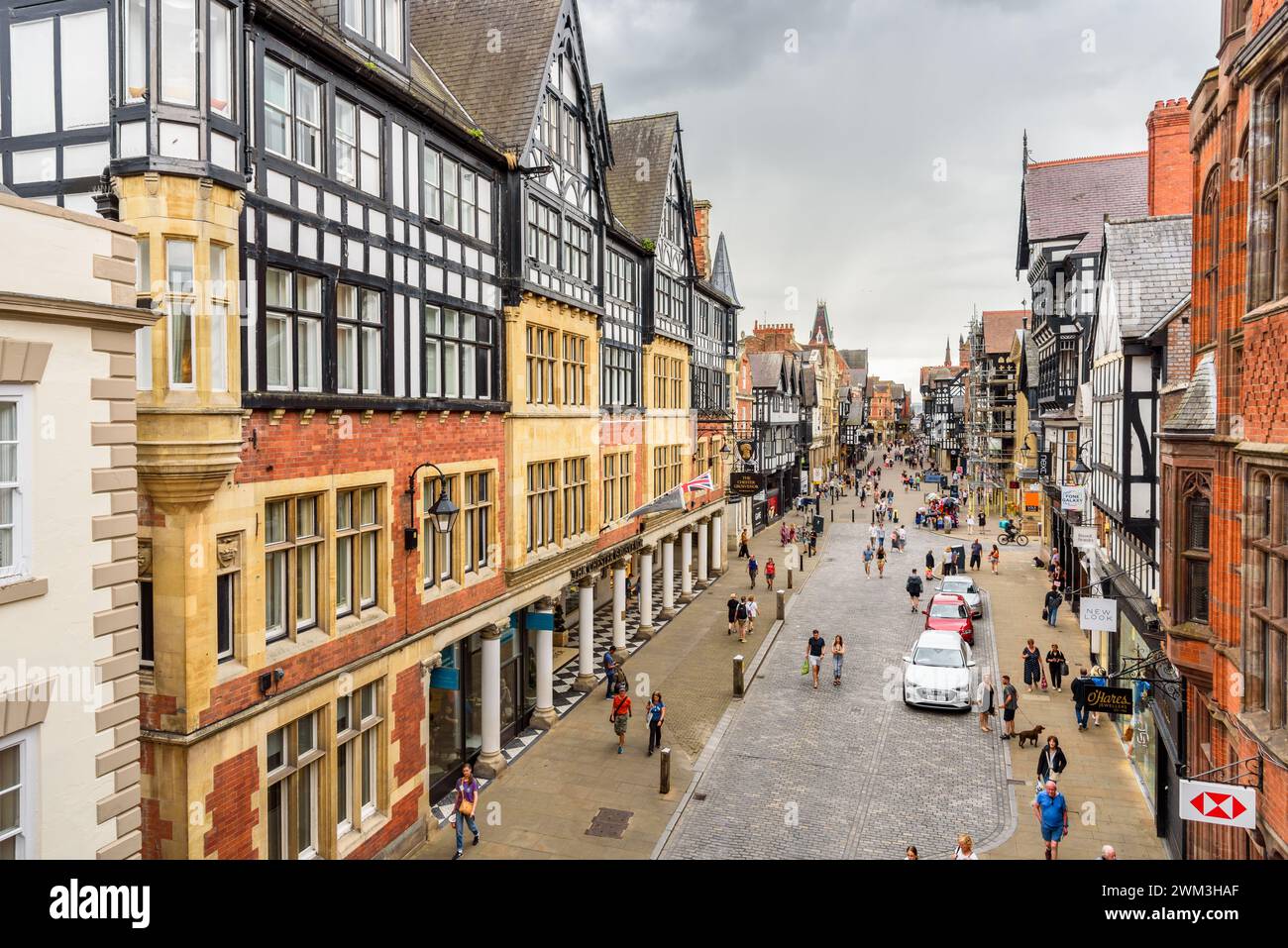 Chester, England - July 09, 2023: People strolling along Eastgate ...