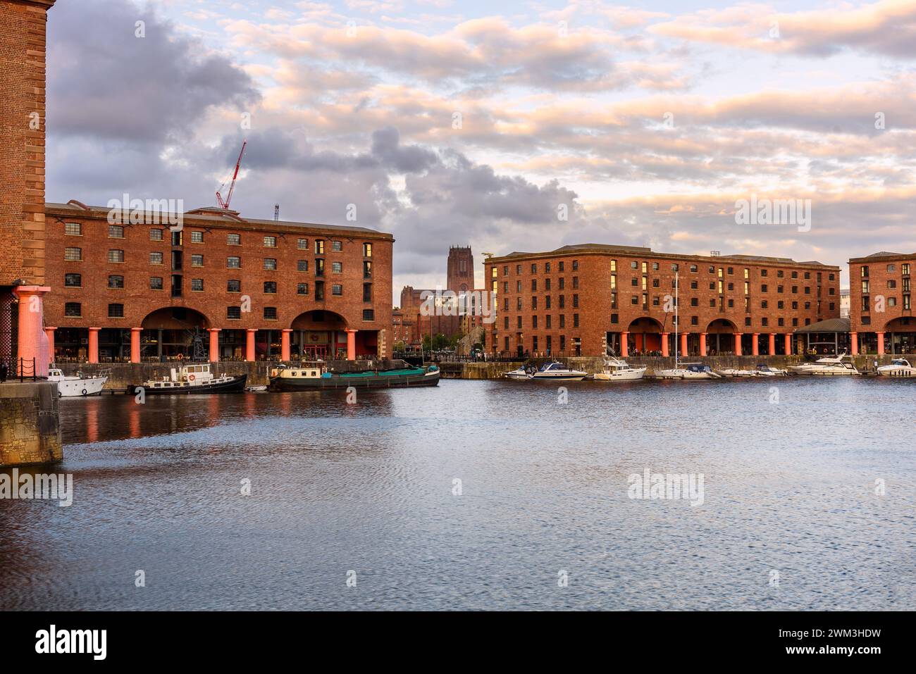 View of Royal Albert Dock with renovated brick dockside warehouses in ...