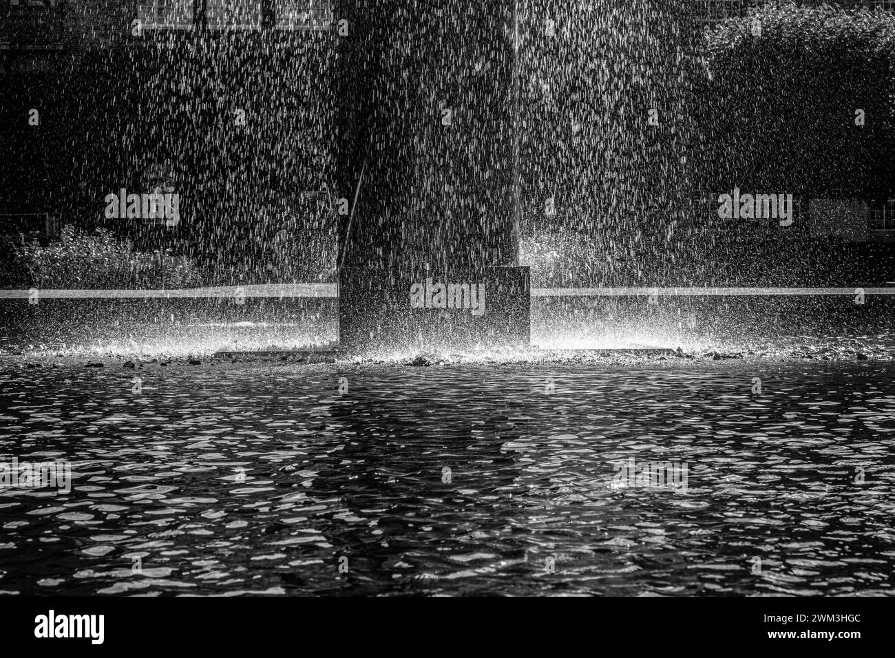 The water feature in The Library Garden between the Royal Library and ...
