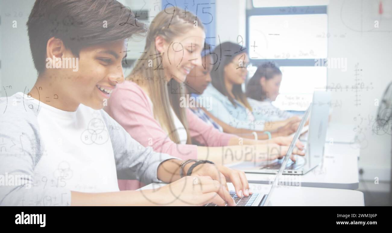 Image of mathematical formulas over students using computers Stock ...