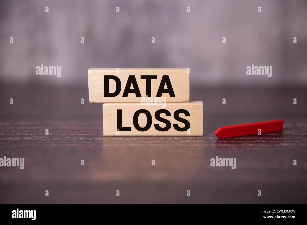 Text DATA LOSS on tablet display in businessman hands on the white ...