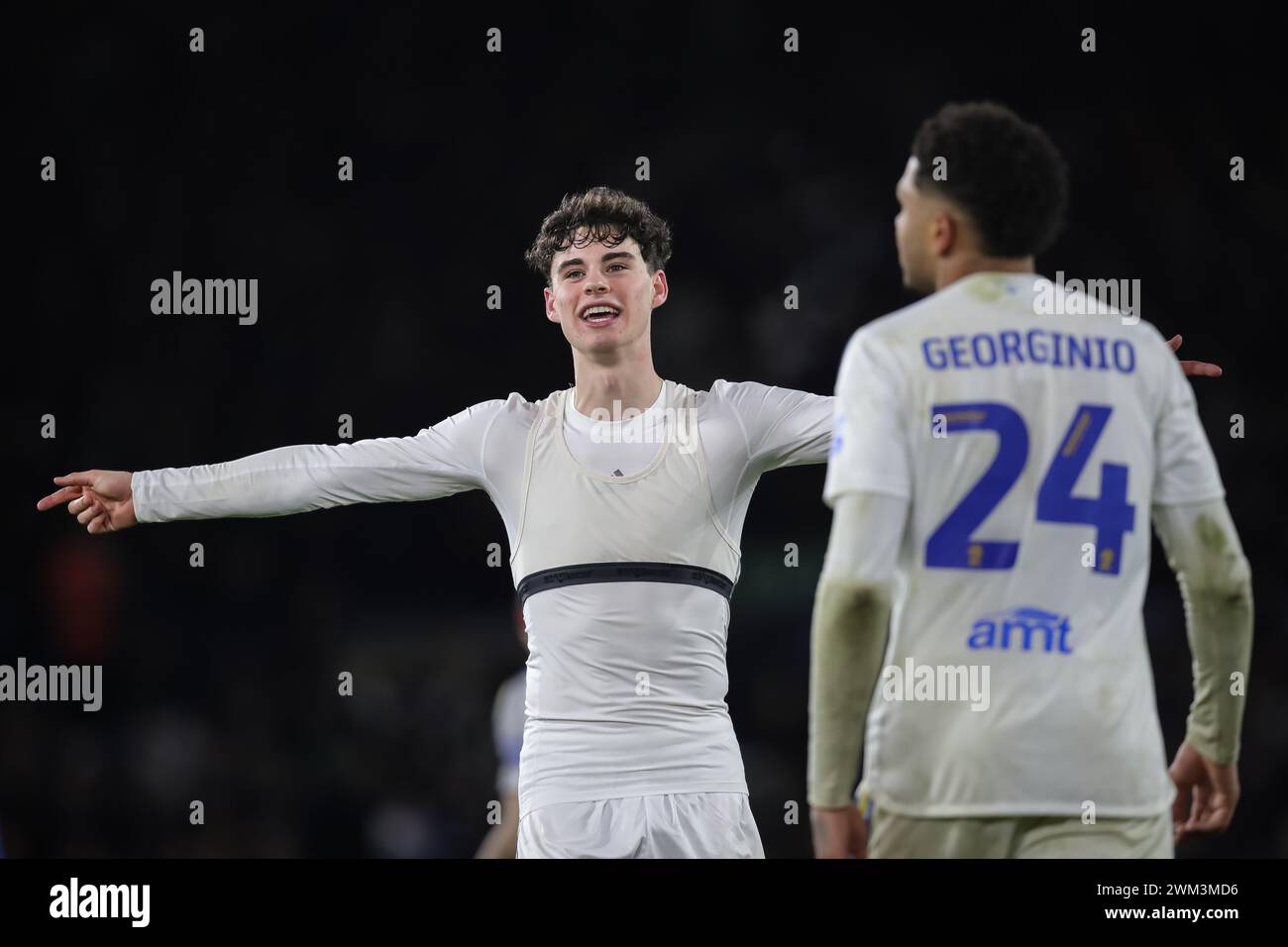 Archie Gray of Leeds United celebrates in front of the supporters after ...