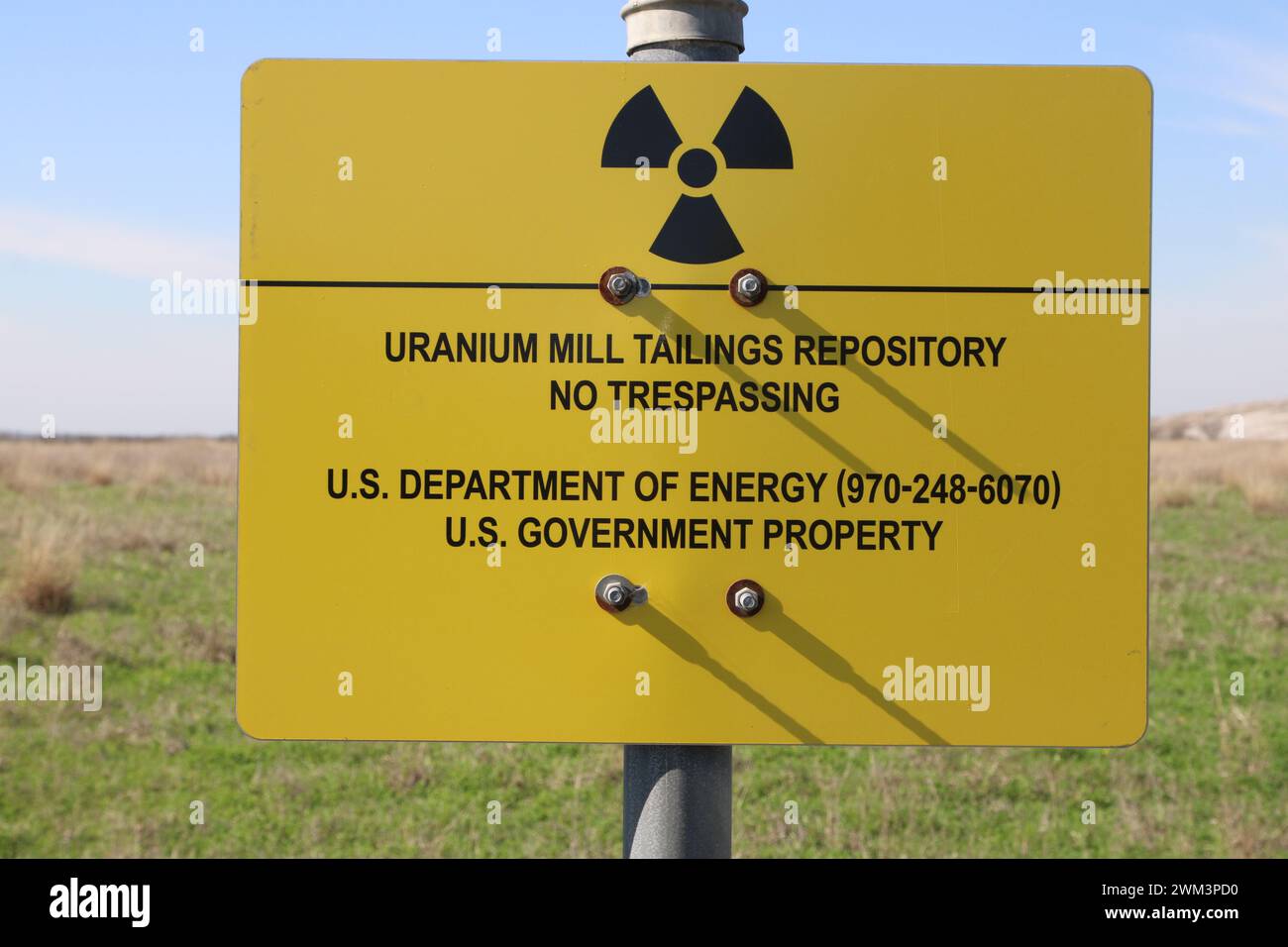 A “Uranium Mill Tailing Repository” and a “Radiation Warning” symbol on ...
