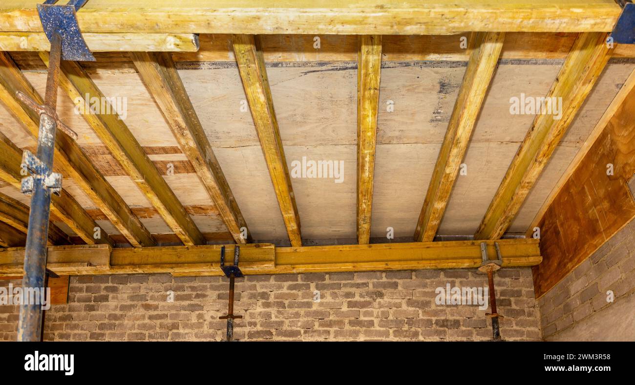 ceiling reinforcement with wood and supported by scaffolding Stock ...