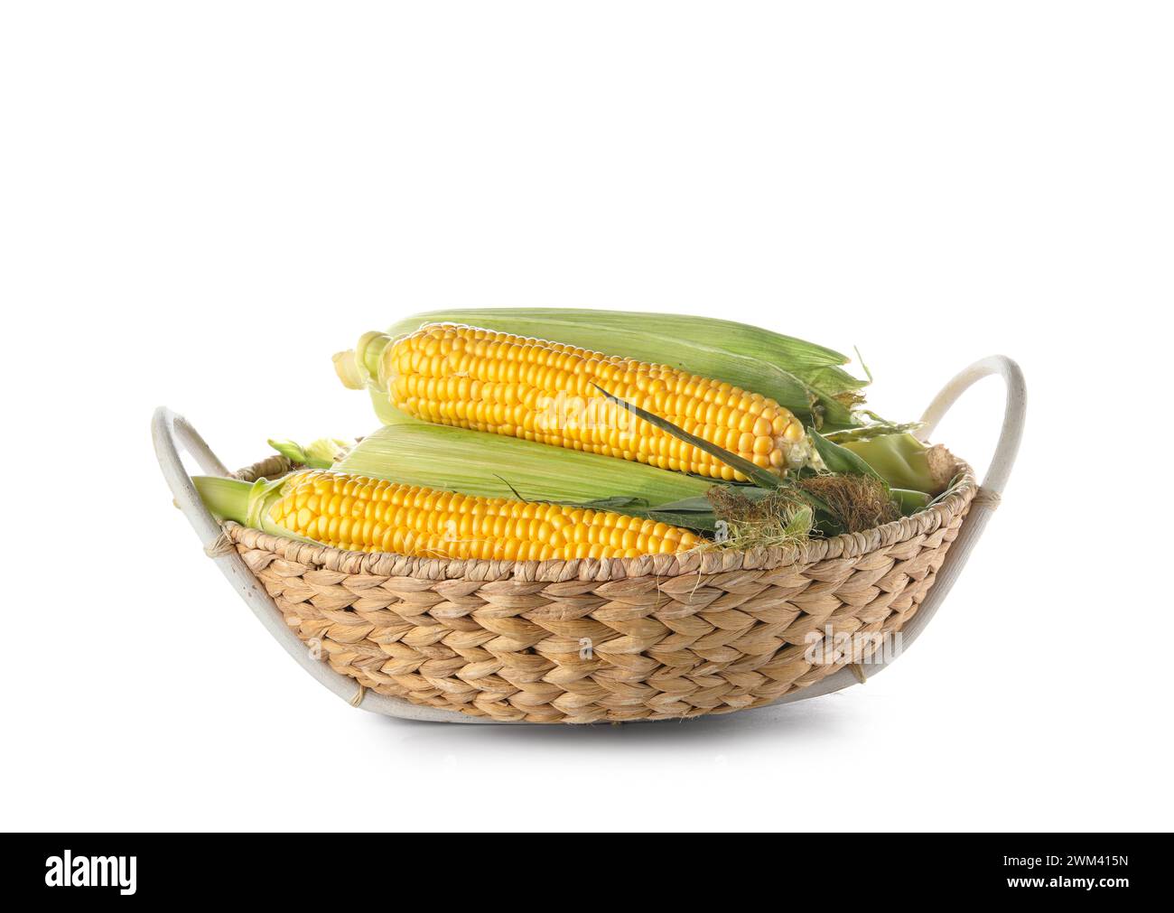 Wicker basket with fresh corn cobs on white background Stock Photo - Alamy